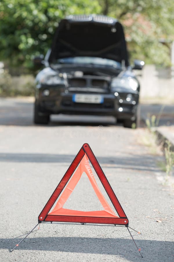 Red triangle car on road stock image. Image of asphalt - 161828719
