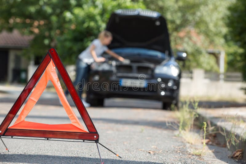 Red triangle car on road stock photo. Image of track - 258025862