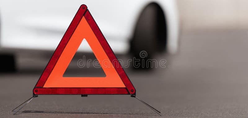 Red Triangle of a Car on the Road Stock Photo - Image of auto, repair ...