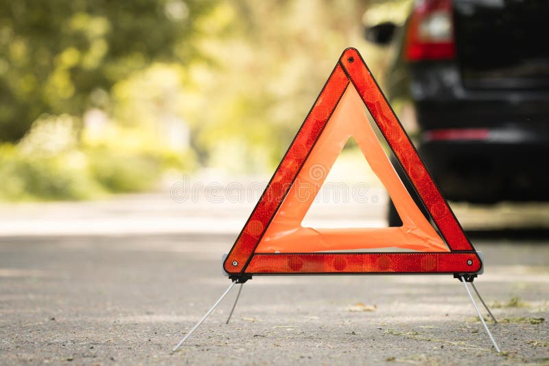 Red Triangle, Red Emergency Stop Sign and Black Car with Technical ...