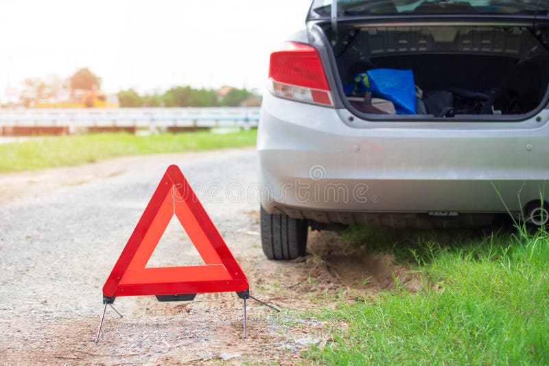 Red Triangle Symbol is Located on the Road To Warn the Car Broken ...