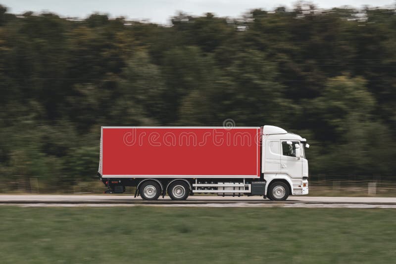 Red Truck Driving on the Countryside Asphalt Road Stock Image - Image ...