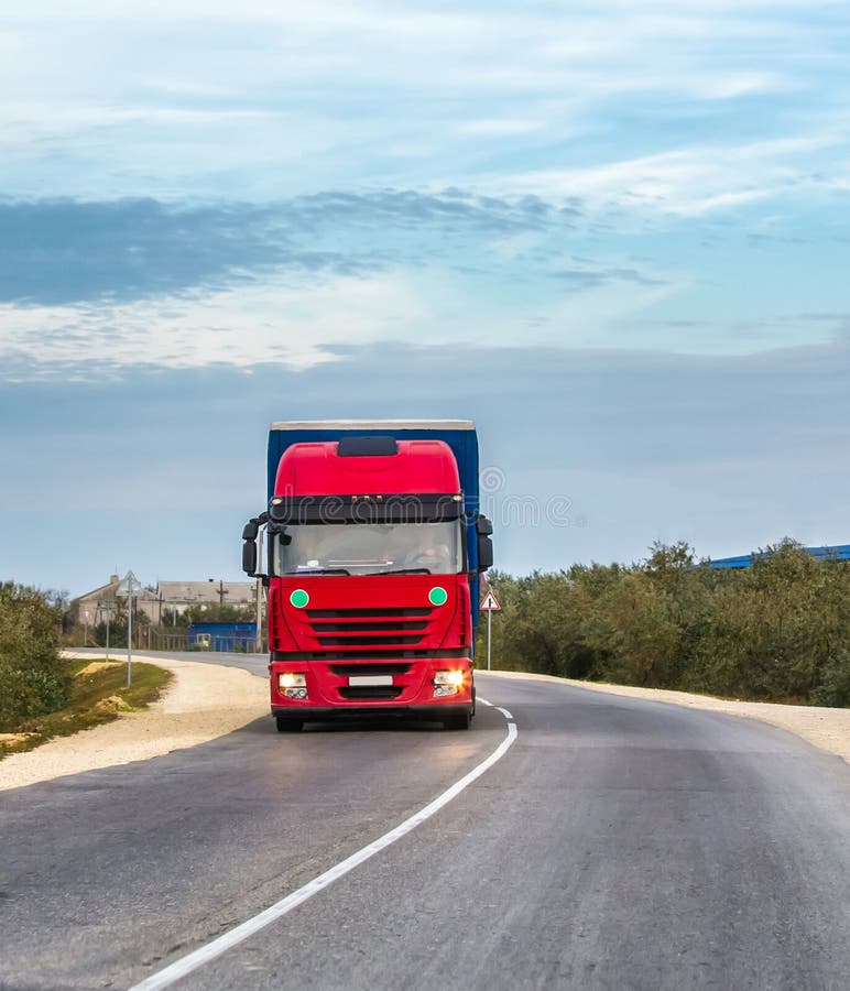 The Red Truck is Moving on the Country Road Stock Image - Image of ...