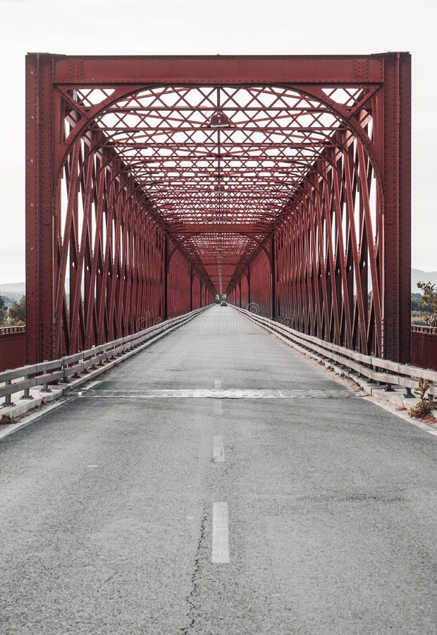 Red Truss Bridge Over a Road, Supported by Metal Girders Stock Photo ...