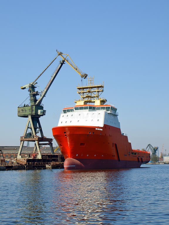 Red tug in shipyard stock image. Image of business, navigate - 10999835
