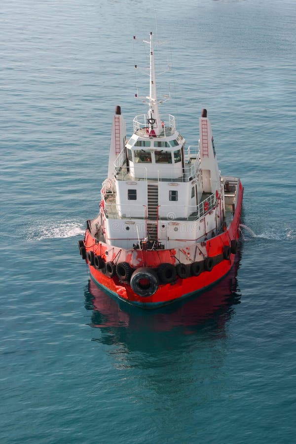 Red tugboat in sea stock image. Image of transportation - 16182527