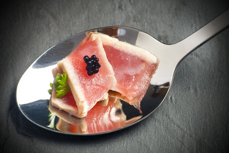 Red tuna on a spoon stock image. Image of delicious, appetizer - 74184651