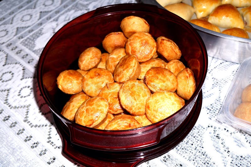 A Red Tupperware with Several Meat Pies or Pies Stock Photo - Image of ...