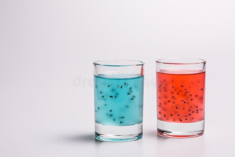 Red and Turquoise Cocktail with Grains on a White Stock Image - Image ...