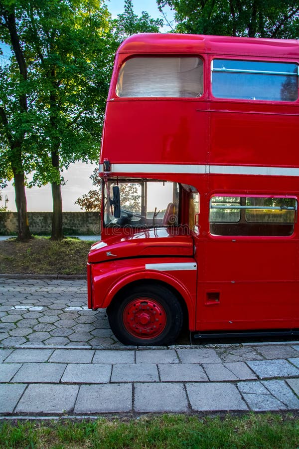 Red Two-story English Bus Standing in the Park on the Waterfront Stock ...