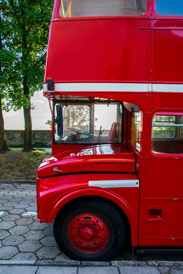 Red Two-story English Bus Standing in the Park on the Waterfront Stock ...