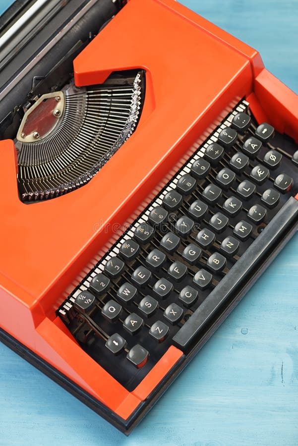 Red Typewriter on Blue Table Stock Image - Image of empty, business ...