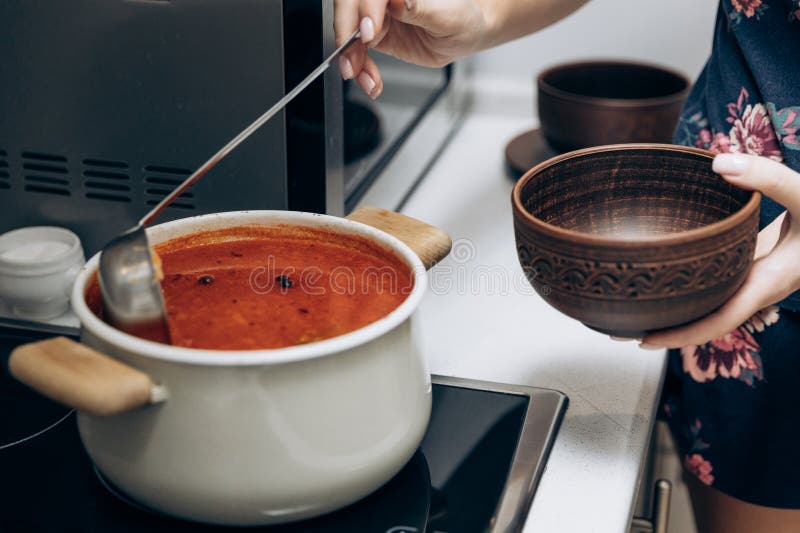 Red Ukrainian Borscht on the Table. Cooking the National First Course ...