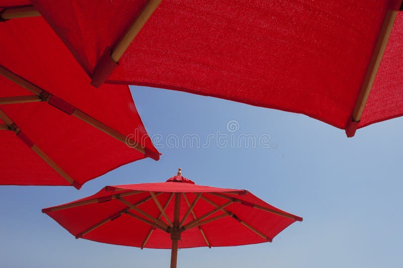 Red Umbrellas on Blue Sky Background Stock Photo - Image of outside ...