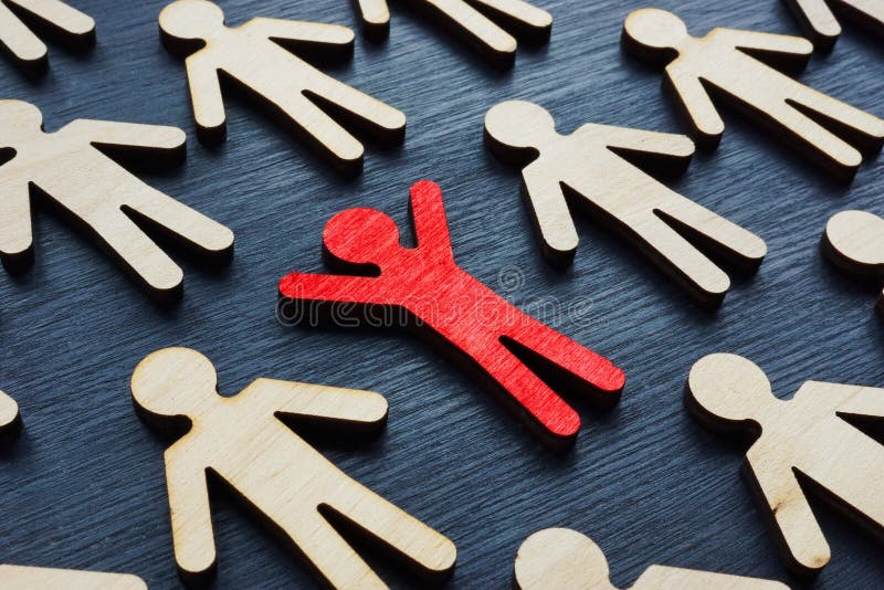 Red Unique Figurine is Stand Out from the Crowd. Stock Photo - Image of ...