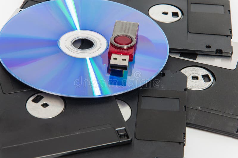 Red Usb Drive Put on Cd and Have Disket Under Them. Stock Image - Image ...