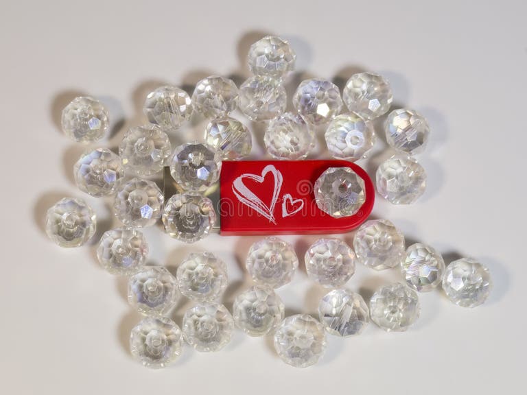 Red USB Flash Drive with Heart, Gems on Light Background Stock Image ...