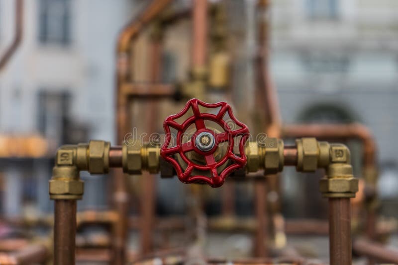 Red Valve on Copper Pipe Construction in Outdoor Stock Image - Image of ...