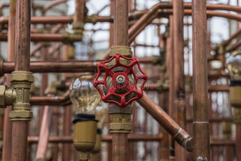 Red Valve on Copper Pipe Construction in Outdoor Stock Photo - Image of ...