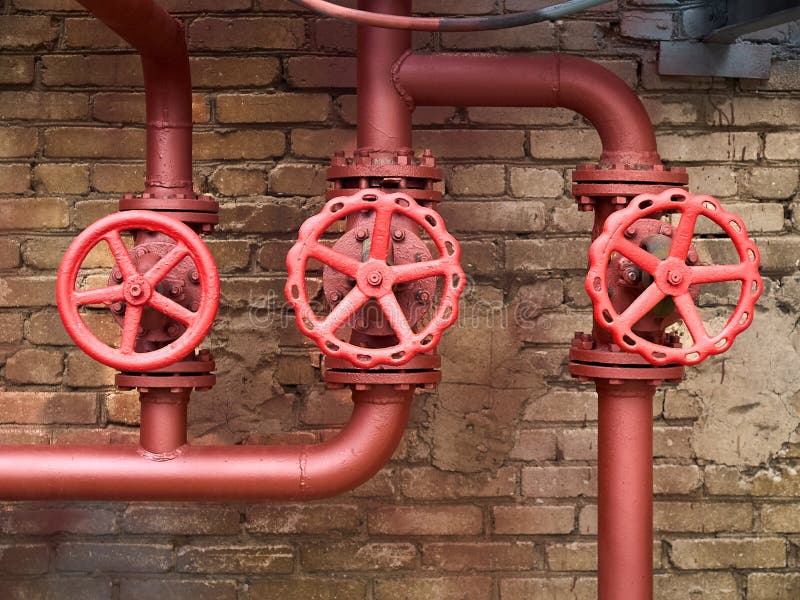 Red Valves Retro Design on Red Hydrant Pipelines with Flanges of ...