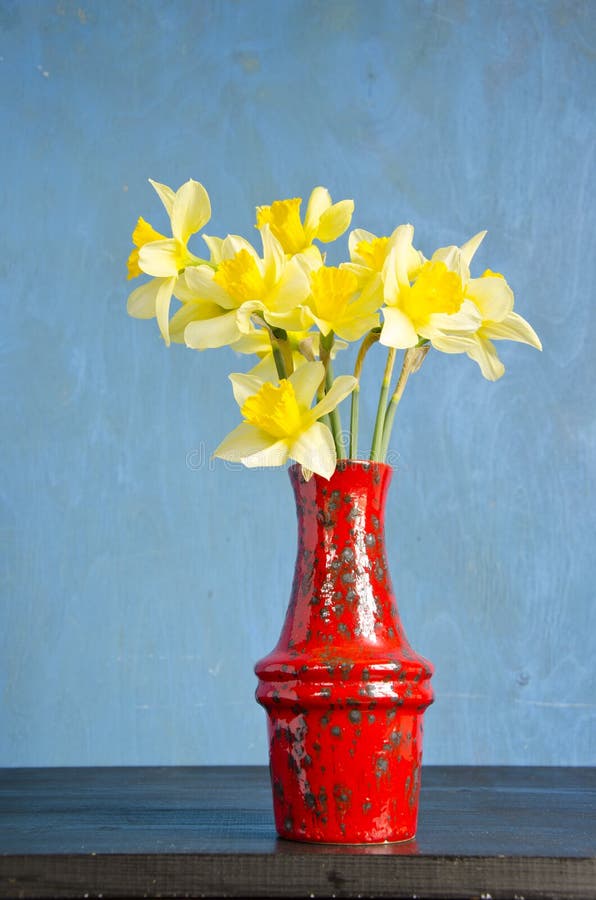 Red Vase on Table with Spring Narcissus Stock Image - Image of plant ...