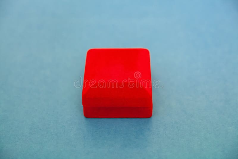 Red Velvet Box on a Blue Background Stock Image - Image of anniversary ...