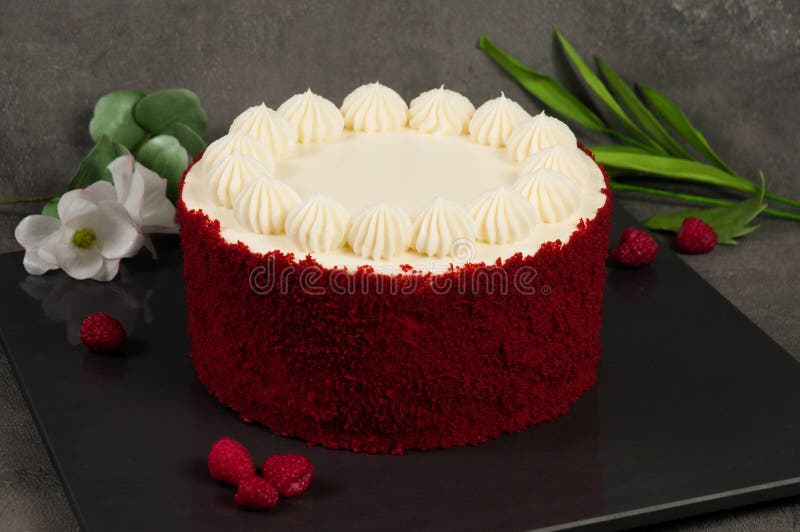 Red Velvet Cake Decorated with Raspberries on a Dark Background Stock ...