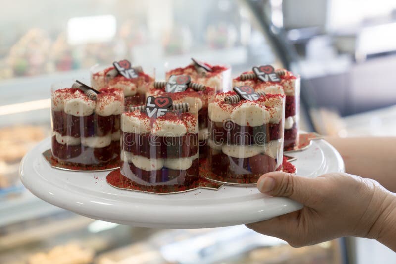 Red Velvet Cupcakes with Cream Cheese Icing on Hand Stock Photo - Image ...