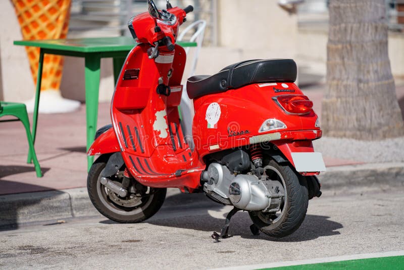 Red Vespa motor scooter editorial stock image. Image of retro - 19607939
