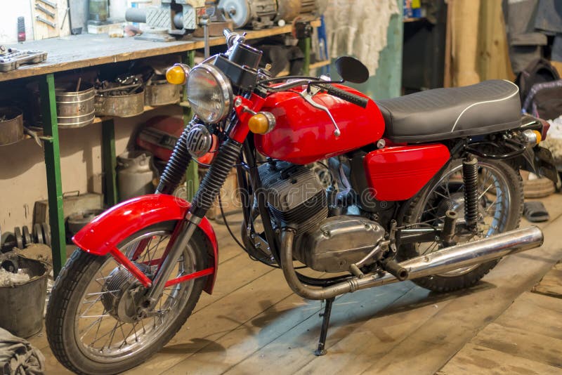 Red Vintage Motorcycle Parked in the Garage Stock Photo - Image of ...