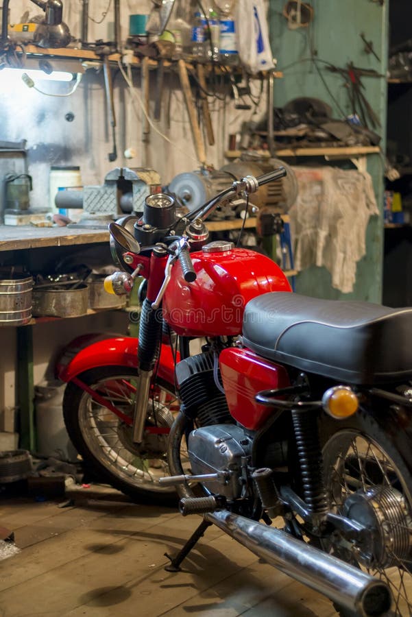 Red Vintage Motorcycle Parked in the Garage Stock Photo - Image of ...