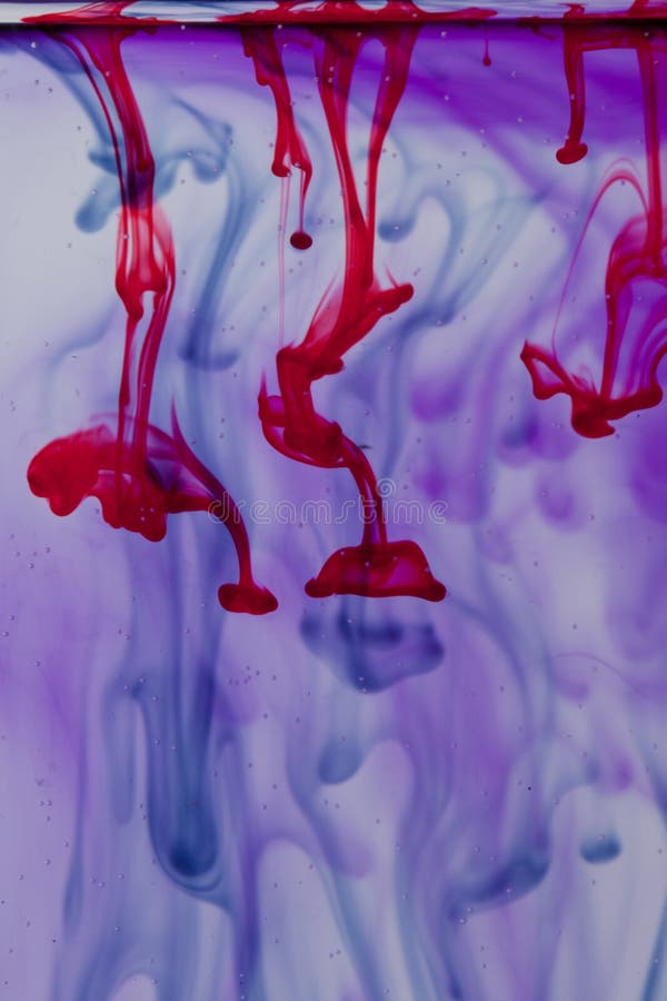 Red and Violet Liquid in Water Stock Photo - Image of blend, chemical ...