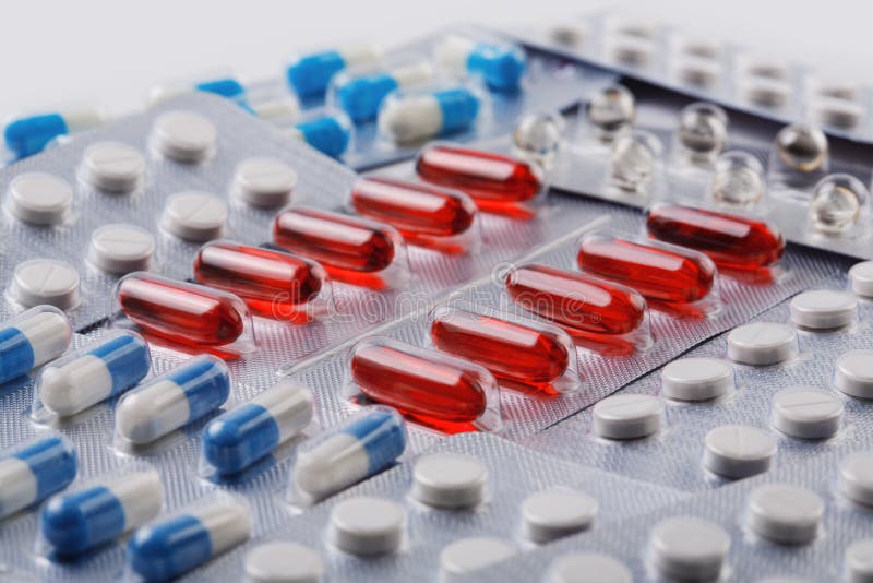 Red Vitamin Pills in Plastic Bag with Other Pills Stock Photo - Image ...