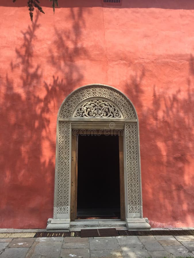 Red wall stock image. Image of entrance, shadow, architecture - 161801765
