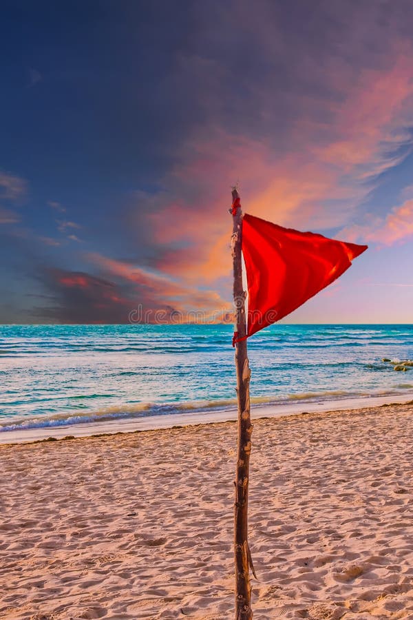 Red Warning Flag on Beach stock image. Image of coast - 124976997