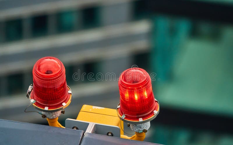 Red Warning Lights on an External Elevator of a High-rise Building ...