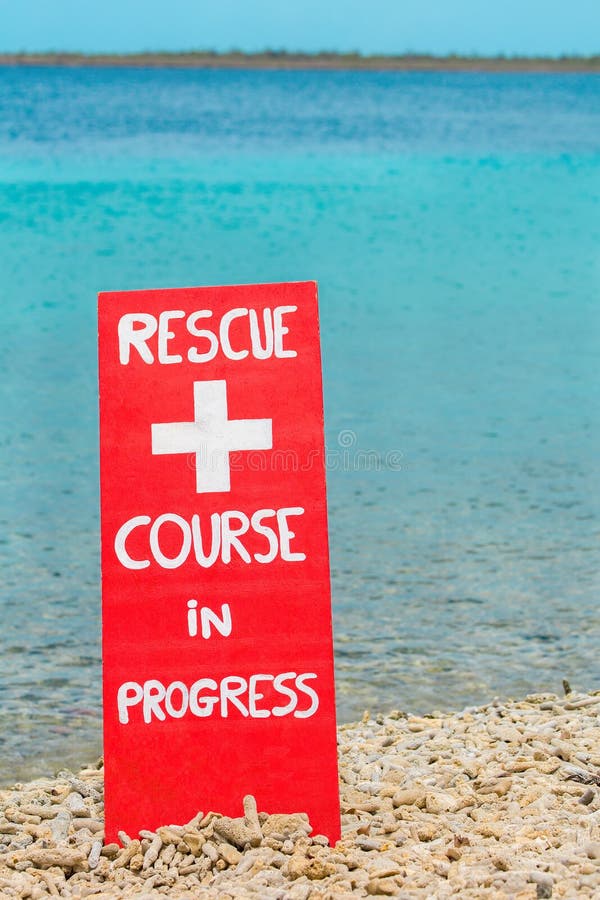 Red Warning Sign for Rescue Exercise Near Sea Stock Photo - Image of ...