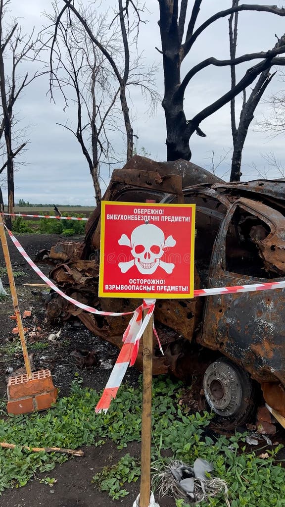 Red Warning Sign that Says Caution, Explosive Objects Stock Image ...