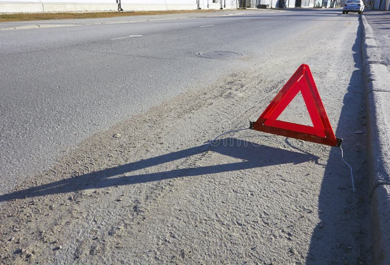 Red Warning Triangle on Street Stock Photo - Image of triangle ...