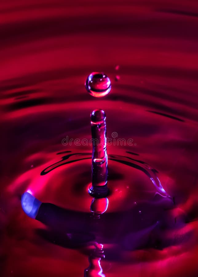 Red Water Droplet - Close Up View Stock Photo - Image of shine, splash ...