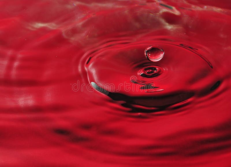 Red Water Splash stock image. Image of center, bright - 21440485