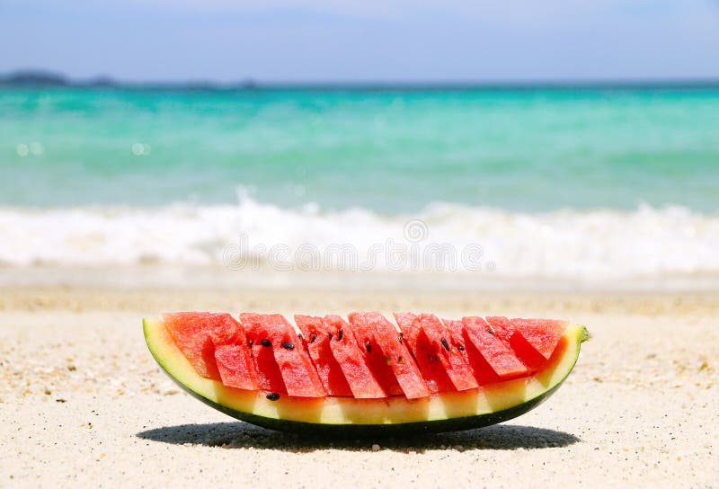 Red Watermelon on a Beautiful White Beach Stock Photo - Image of blue ...
