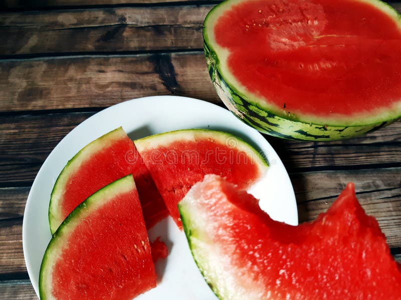 Red Watermelon on the Kitchen Table Stock Image - Image of slice, sweet ...