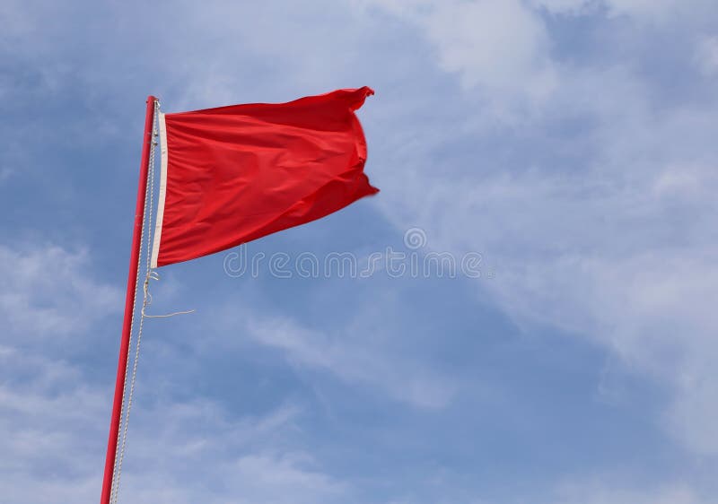 Red Waving Flag Indicating a State of Danger Stock Image - Image of ...