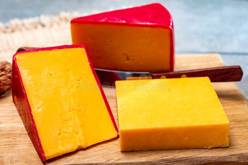 Red Waxed Yellow Cheddar Cheese Close Up Stock Image - Image of dessert ...