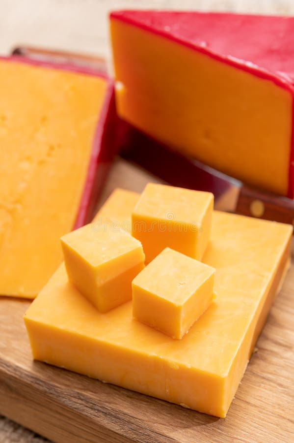 Red Waxed Yellow Cheddar Cheese and Crackers with Grated Cheese Stock ...