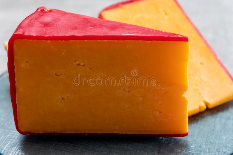Red Waxed Yellow Cheddar Cheese Close Up Stock Image - Image of table ...