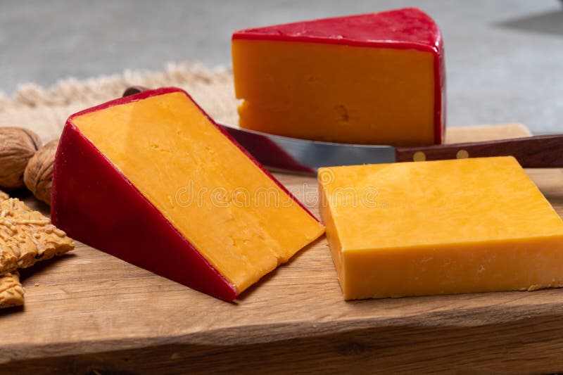 Red Waxed Yellow Cheddar Cheese Close Up Stock Photo - Image of snack ...