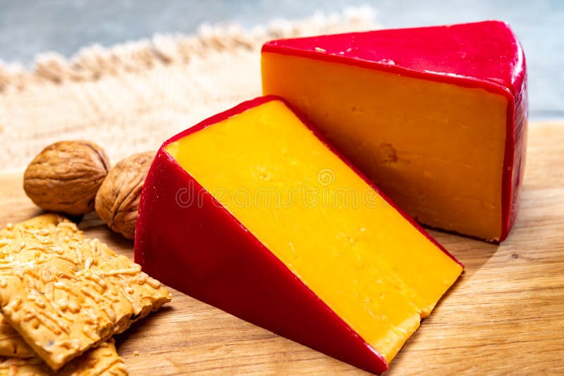 Red Waxed Yellow Cheddar Cheese and Crackers with Grated Cheese Stock ...