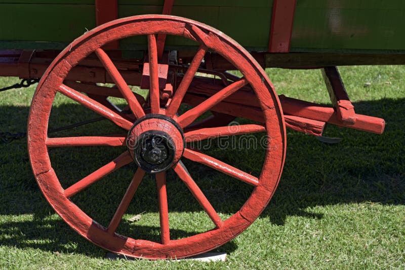 Red wheel of ancient wagon stock photo. Image of cart - 78171918